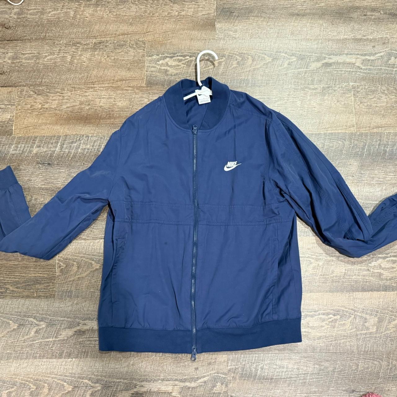 Navy blue Nike Jacket Jacket is on the more thin side | Depop