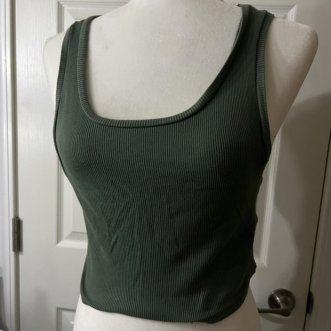 Green ribbed tank top!! A lot like the skims green... - Depop