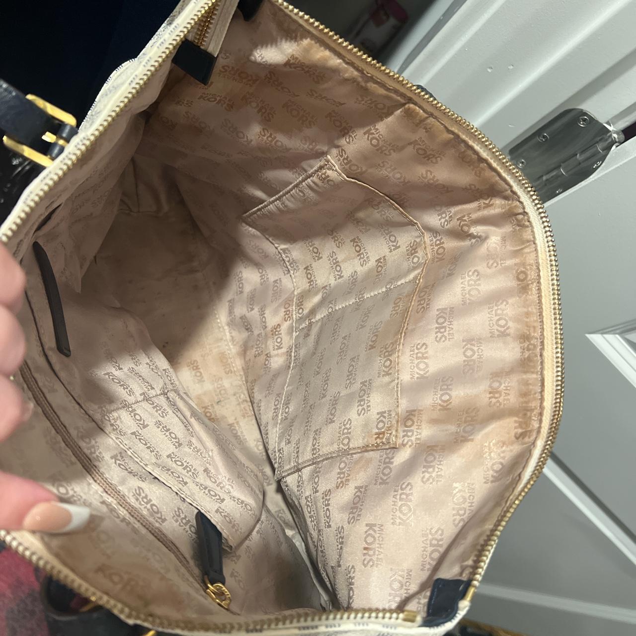 MK purse, spilled fake tan in it so the inside is... - Depop