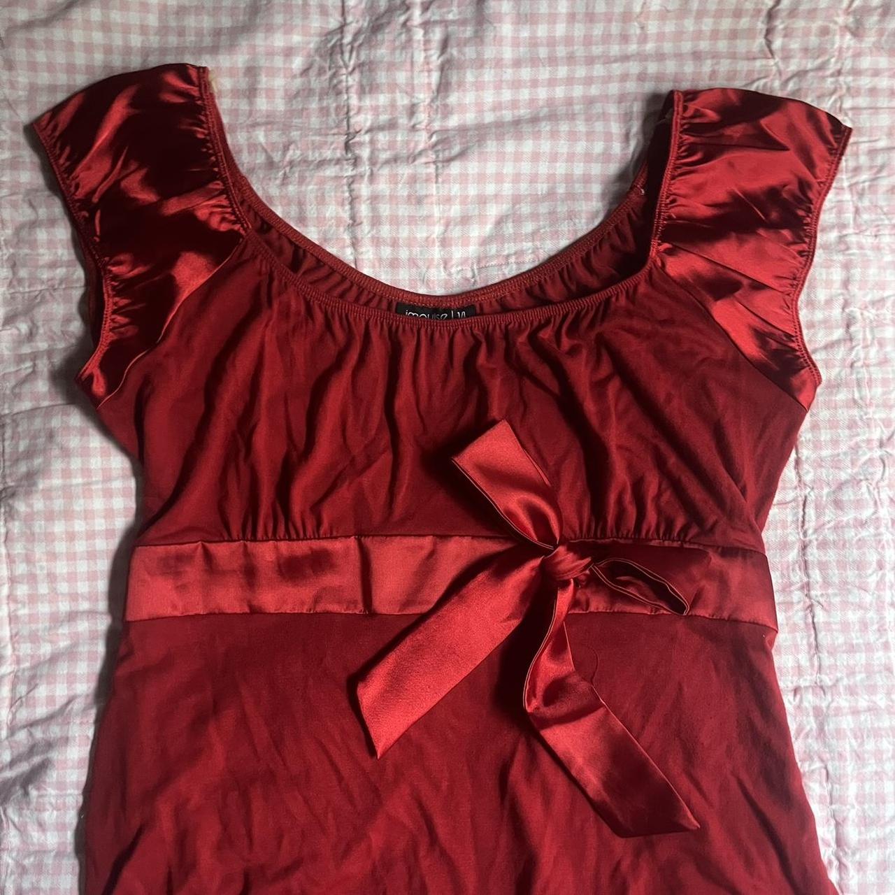 Red satin top with ruffle sleeves and bow detail... | Depop
