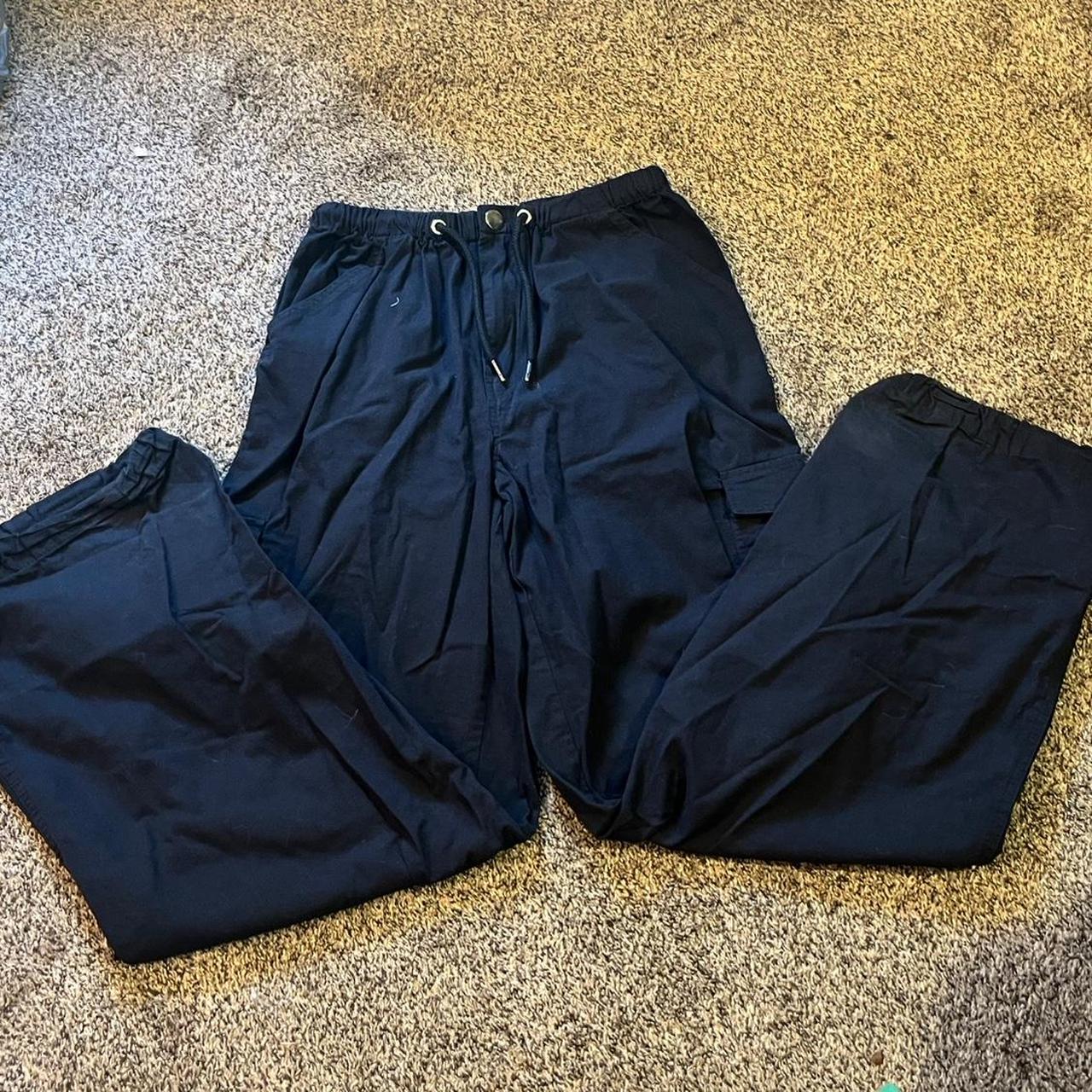 Low rise black cargo pants with draw strings and... | Depop