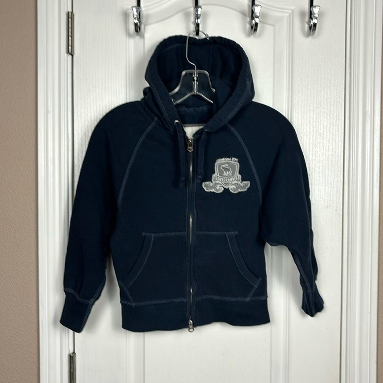 Abercrombie & Fitch Unisex Kids Navy Zip Up Kangaroo... - Depop