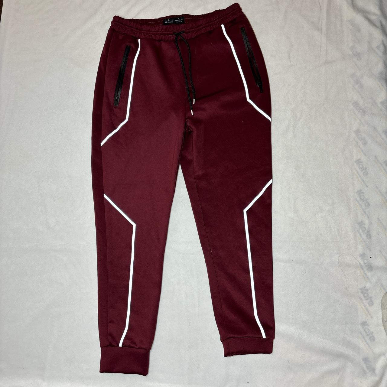 Medium maroon/ burgundy sweats with light reflecting... - Depop