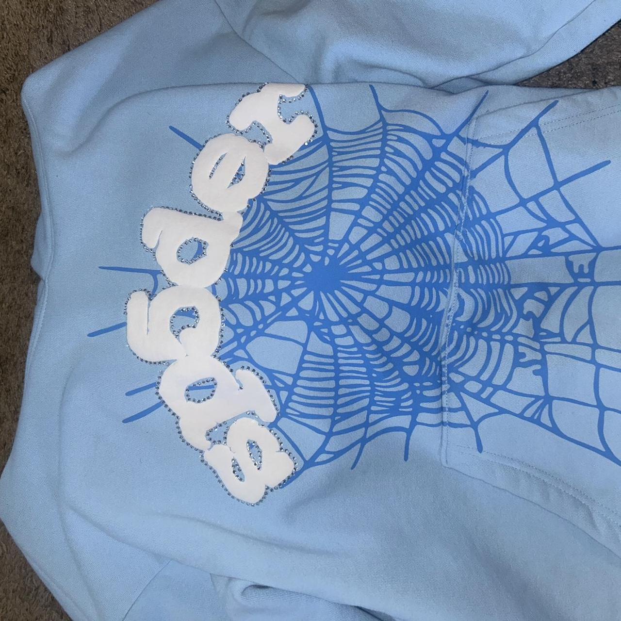 light blue spider hoodie send offers and can ship... - Depop