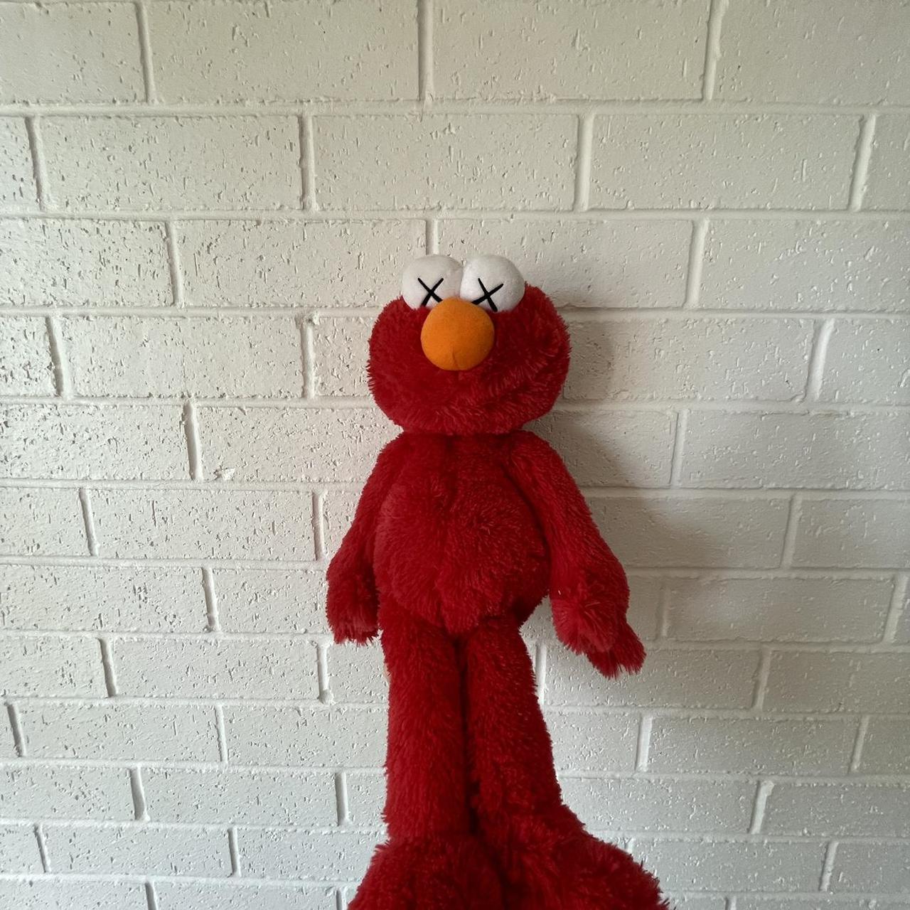 Uniqlo x Kaws x Sesame Street Elmo and Cookie... - Depop