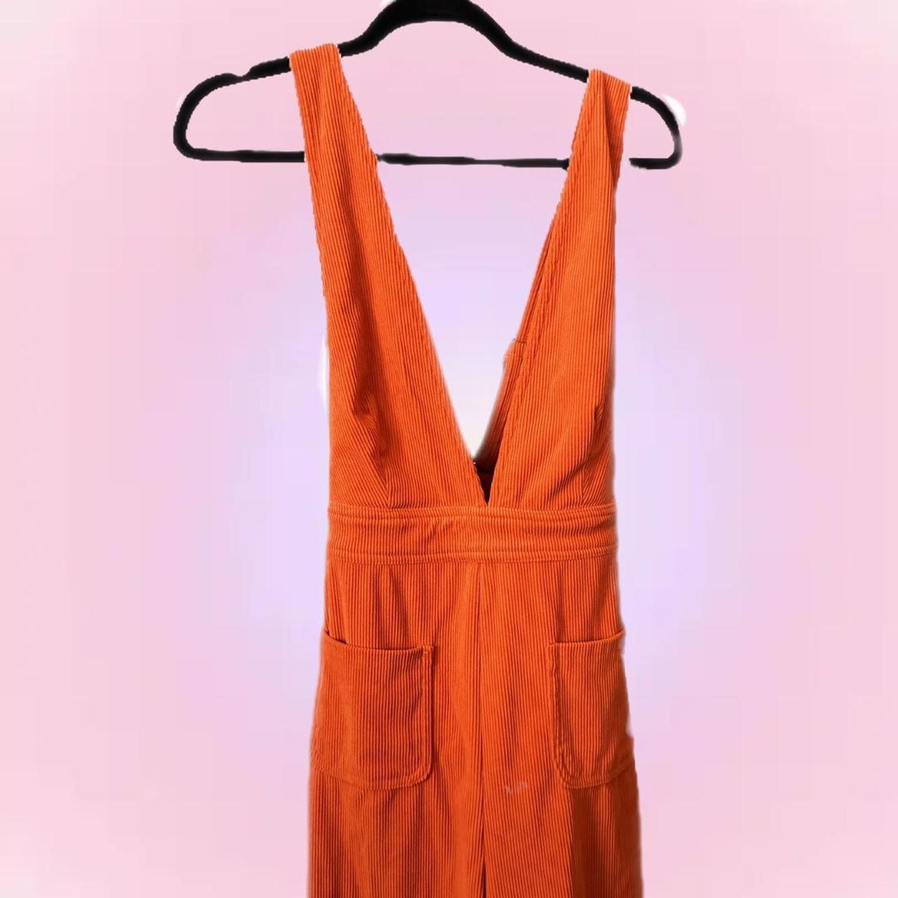 large orange overalls/ jumpsuit. great condition and... - Depop