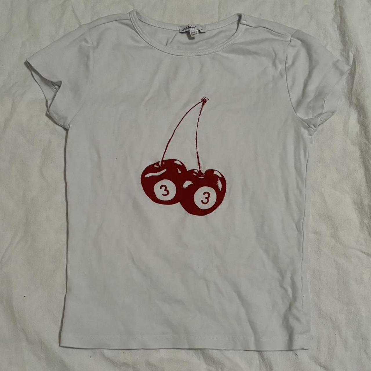 subdued baby tee with red cherry design worn once,... - Depop