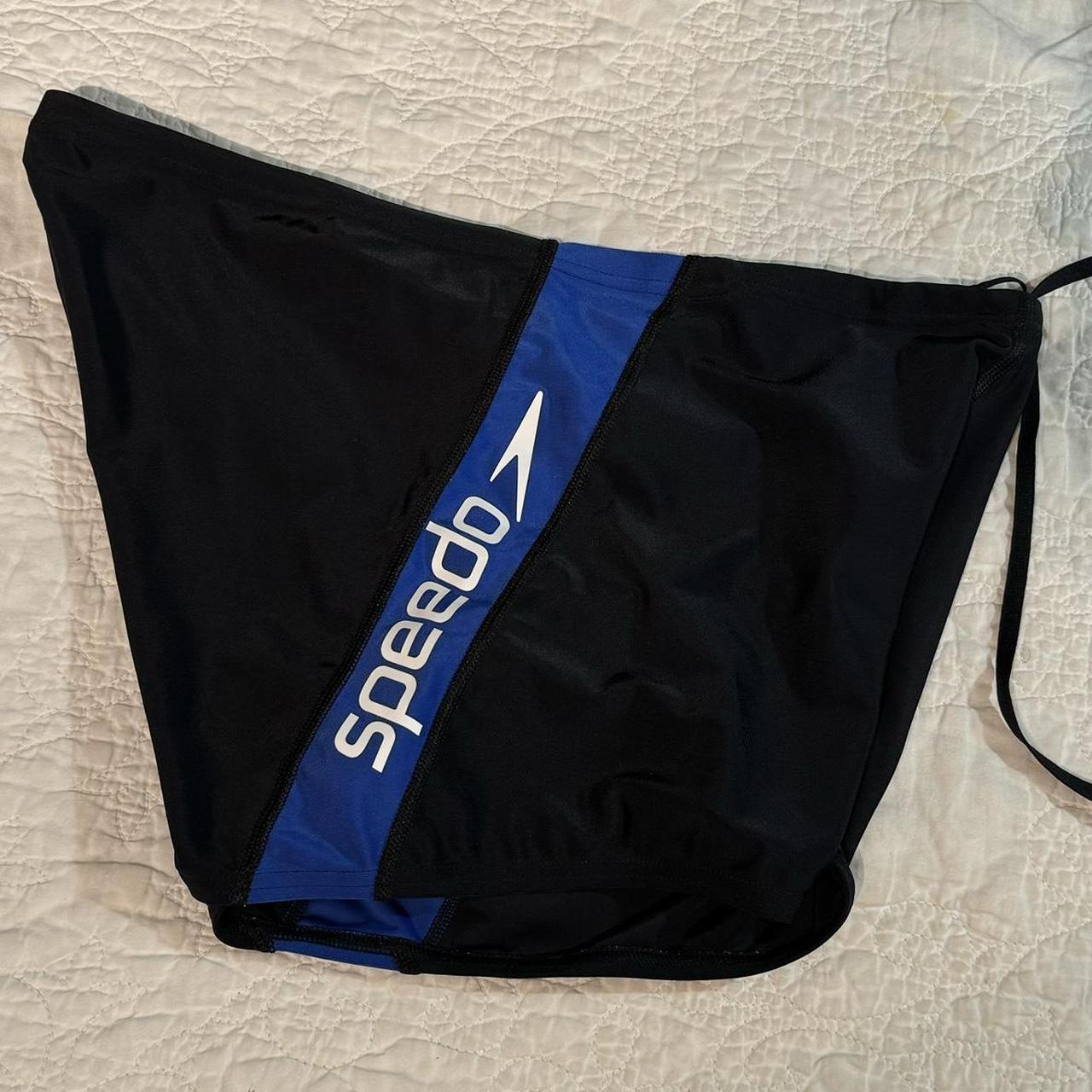 Speedo black swim shorts with blue stripe - Depop