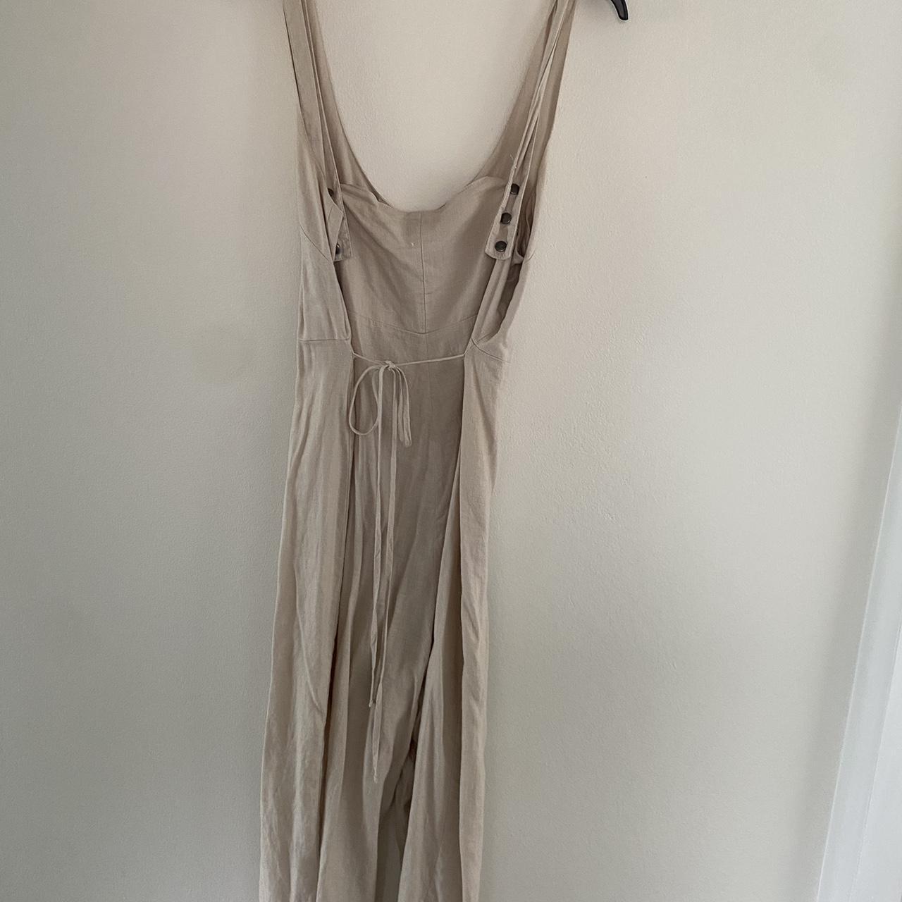 Afends beige jump suit with adjustable straps. Size... - Depop