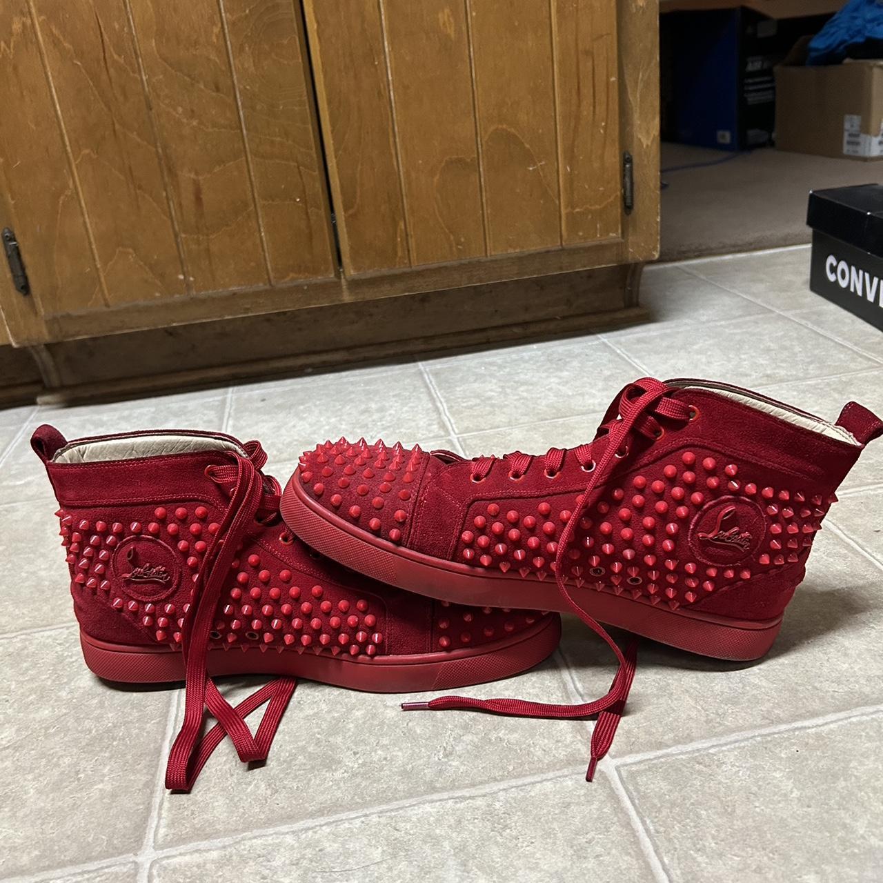 Pretty worn Red spiked Christian Louboutin high... - Depop