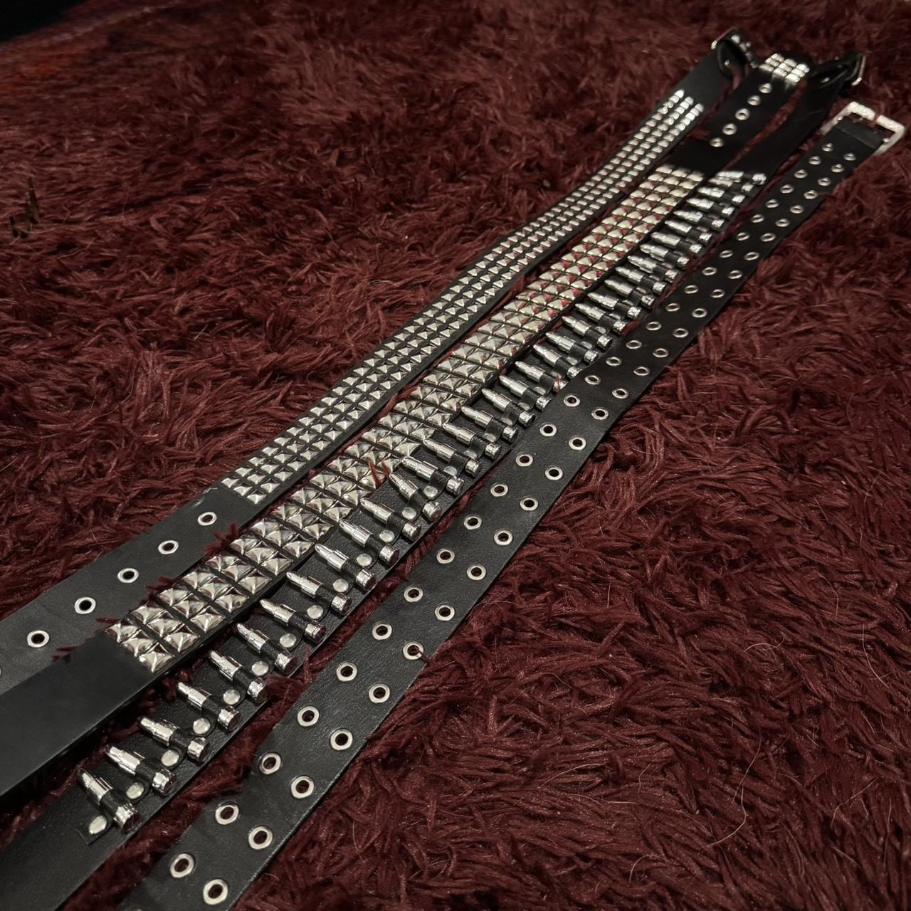 4 black and silver studded punk belt, and a bullet belt | Depop