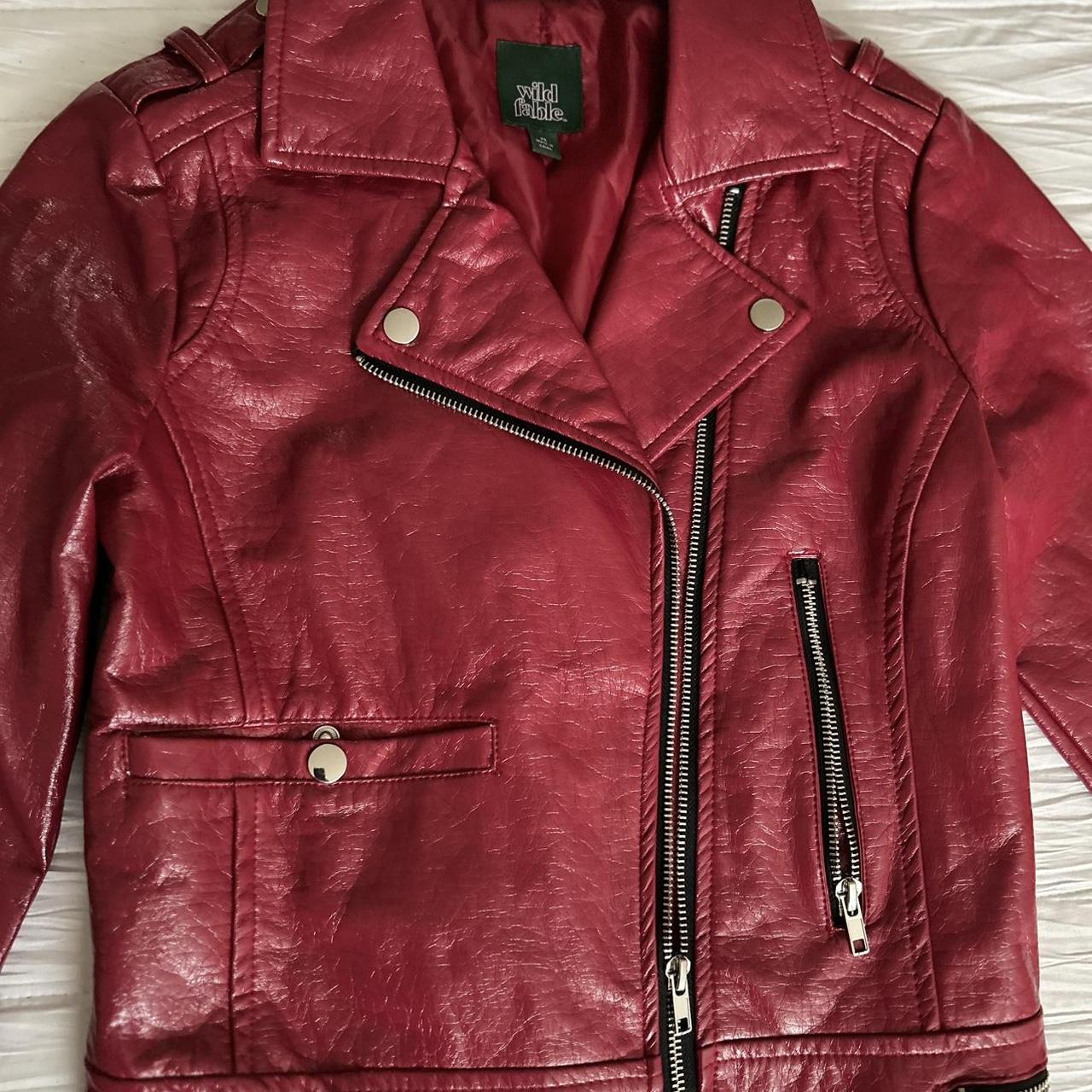Red leather jacket with black accents and zippered... - Depop