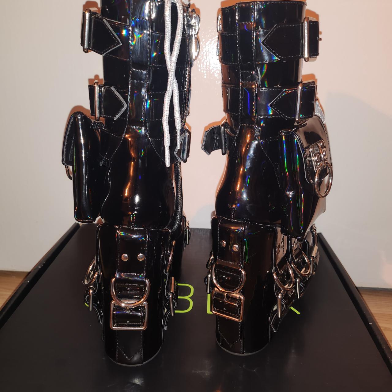 DOLLS KILL Darkest Bounty Holographic Traitor Boots... - Depop