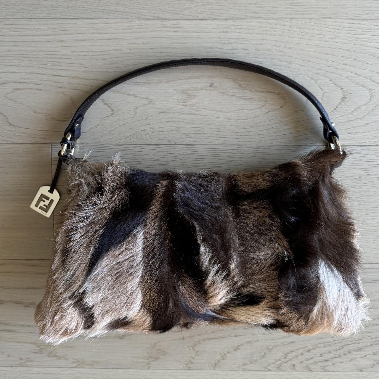 Vintage Fendi fur baguette. Use code... - Depop