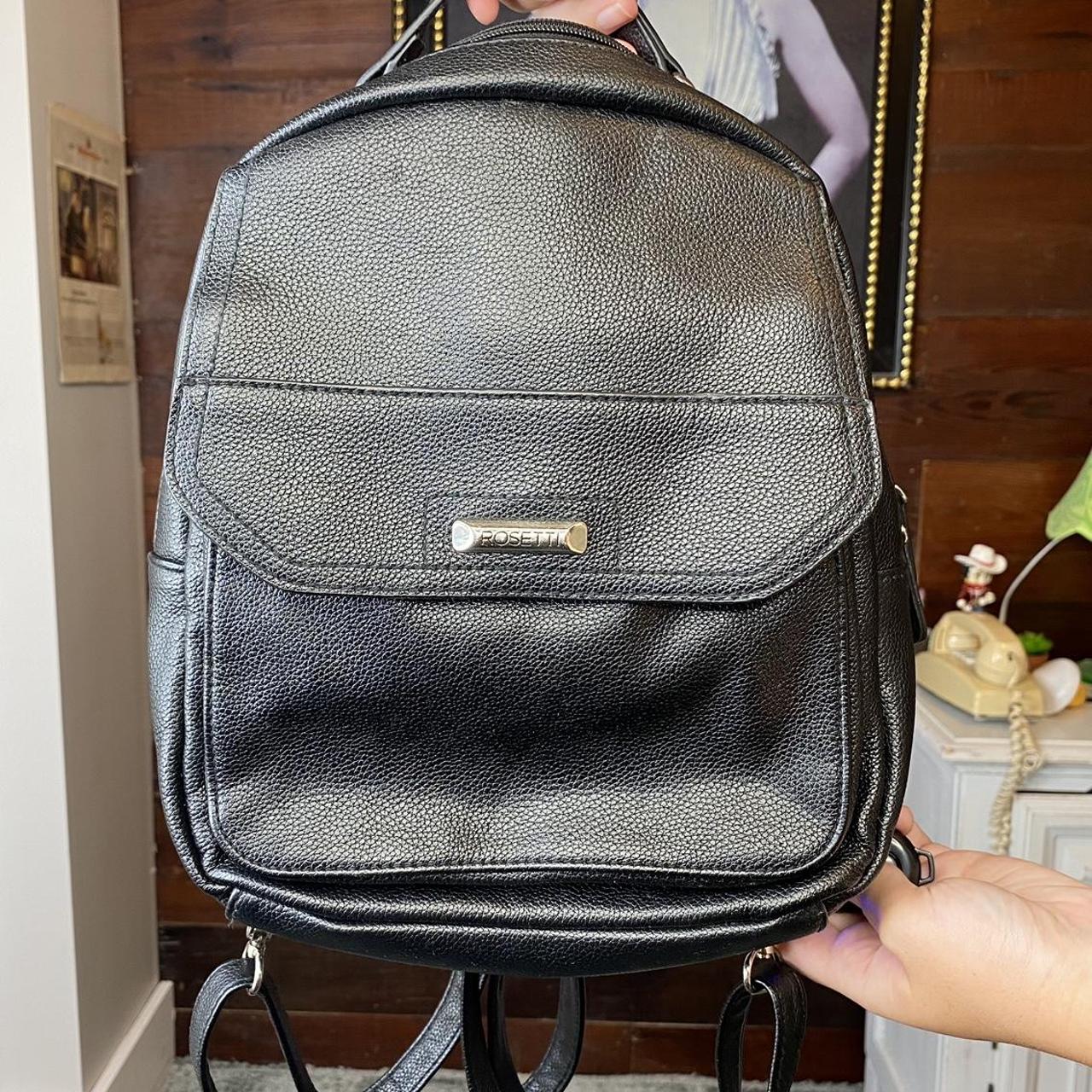 Rosetti black faux leather backpack purse Straps are... - Depop