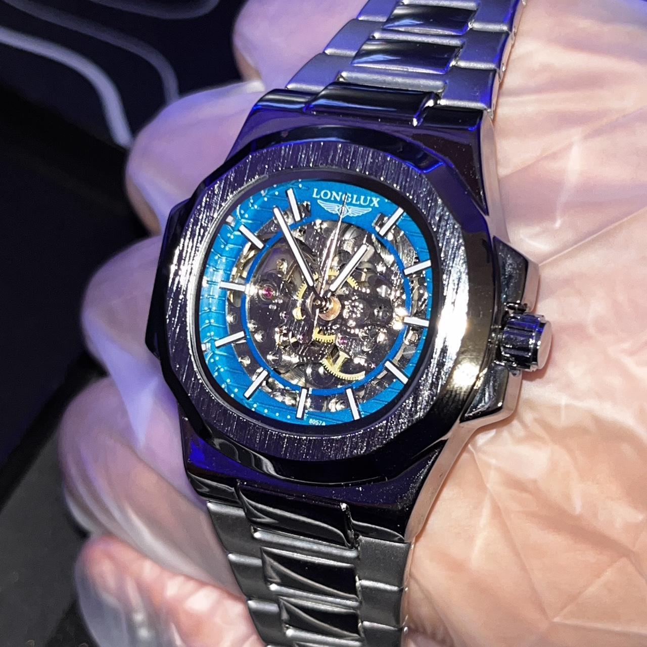 Silver automatic watch with moving parts inside ... - Depop