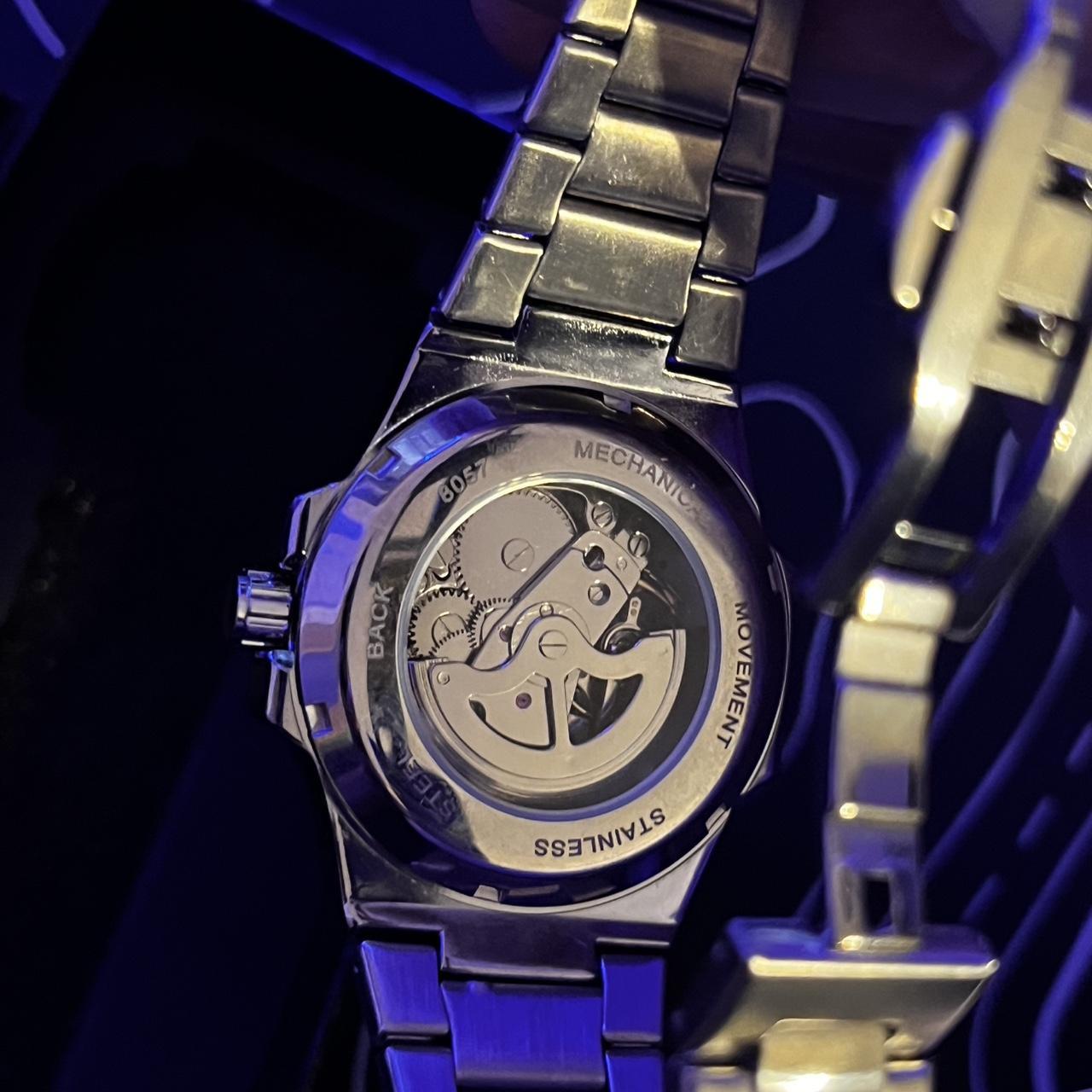 Silver automatic watch with moving parts inside ... - Depop