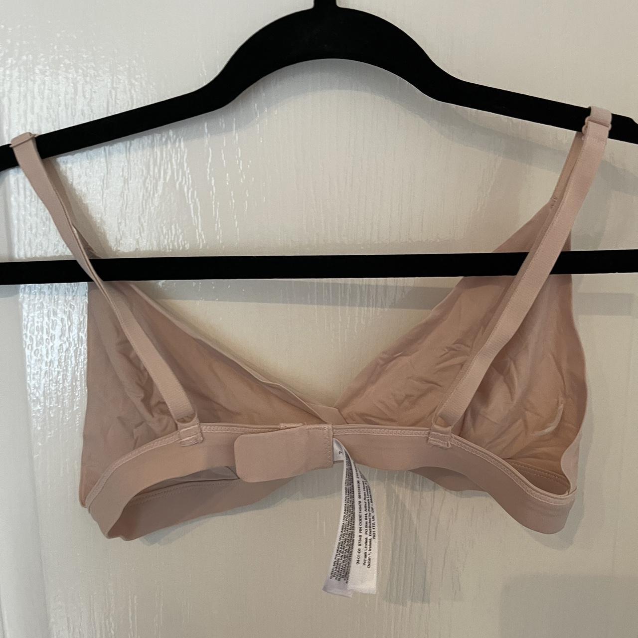 Light pink/tan bralette never worn - Depop