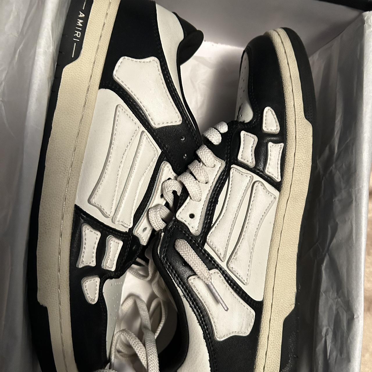Black and white bone amiris slightly worn getting... - Depop