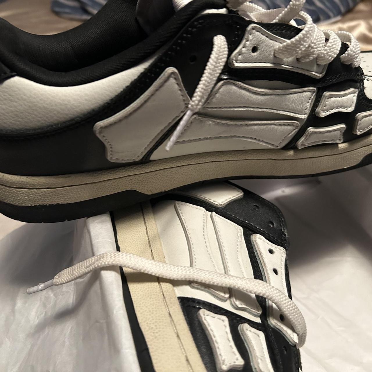 Black and white bone amiris slightly worn getting... - Depop