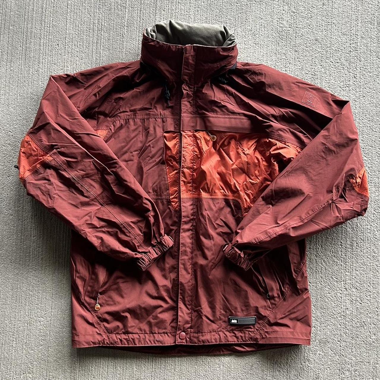 REI red/orange rain jacket size M has multiple zip... - Depop