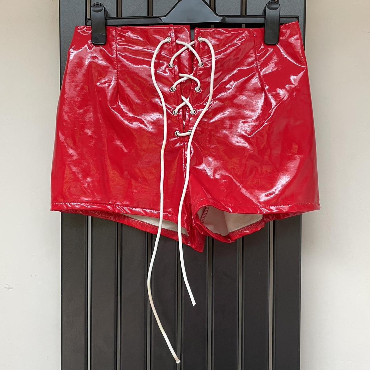 Lace up red pvc shorts Unsure of size I’d say... - Depop