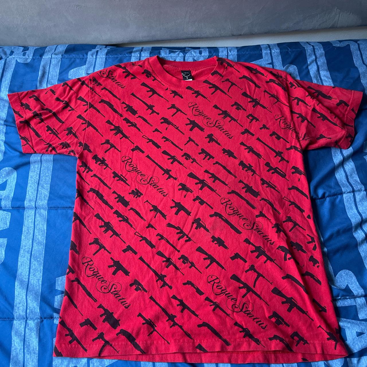 Red and black Rogue Status Gun Shirt Measures... | Depop