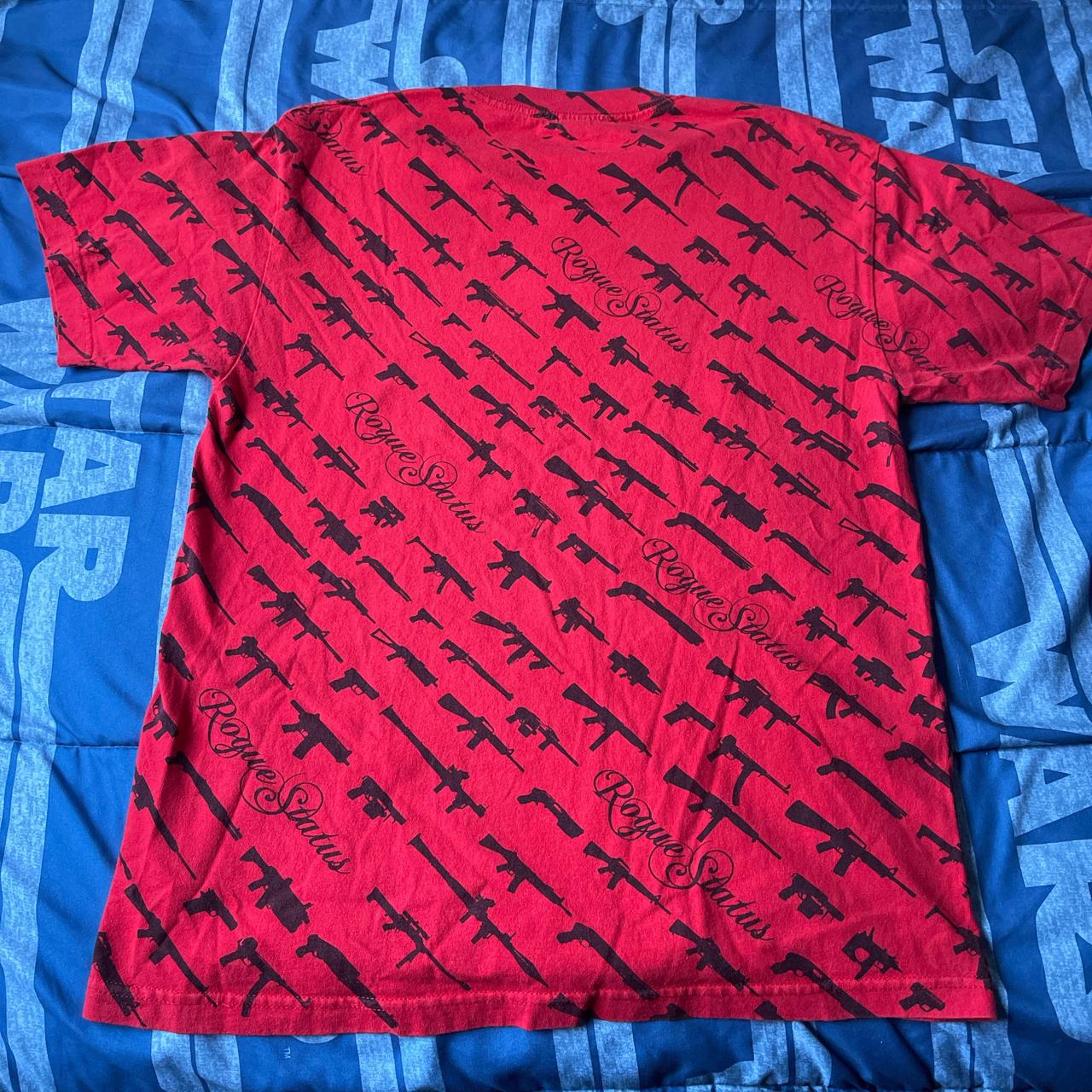 Red and black Rogue Status Gun Shirt Measures... | Depop