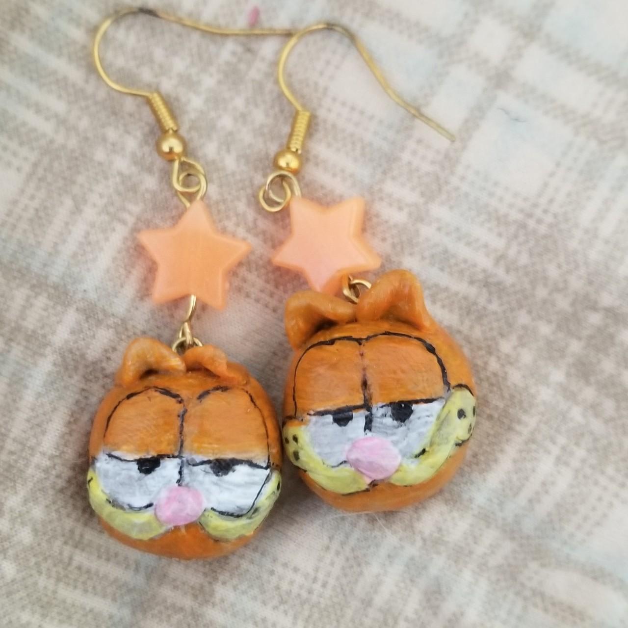 handmade garfield clay earrings have been worn, I... - Depop