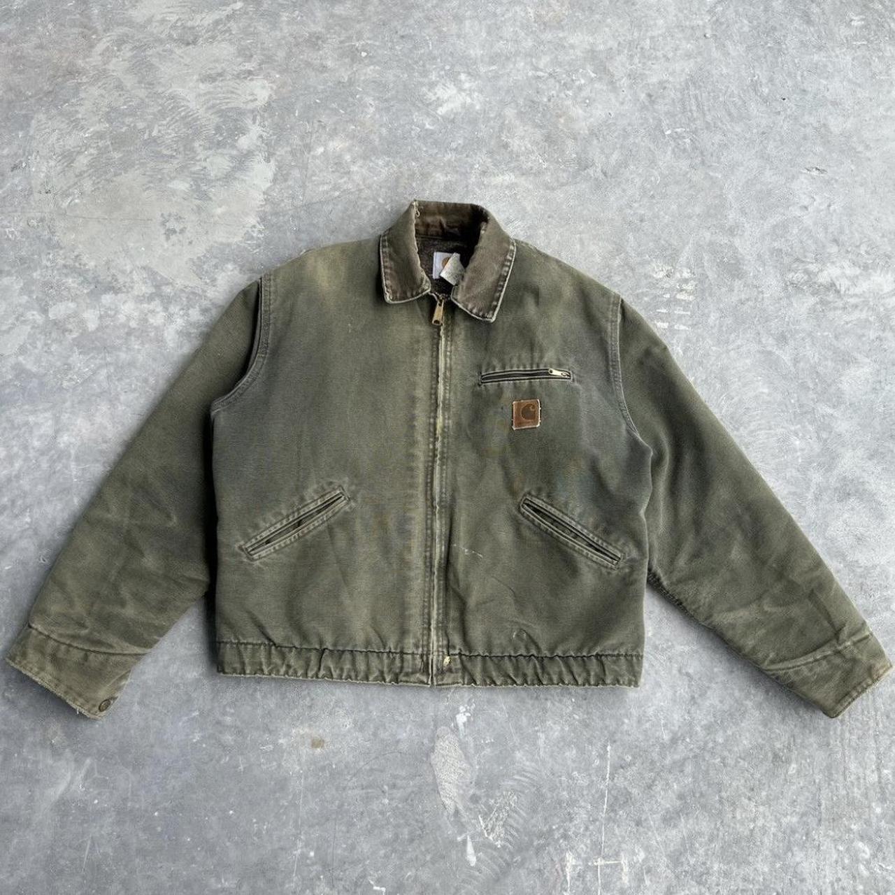 Carhartt green jacket with a worn look jacket... - Depop