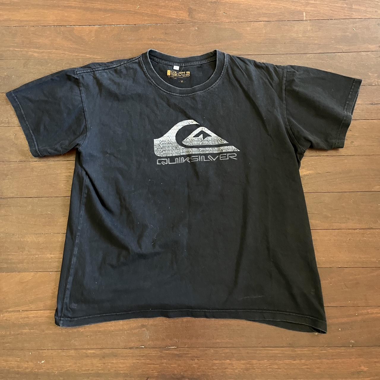 Vintage quicksilver tee! Faded black fabric gives it... - Depop