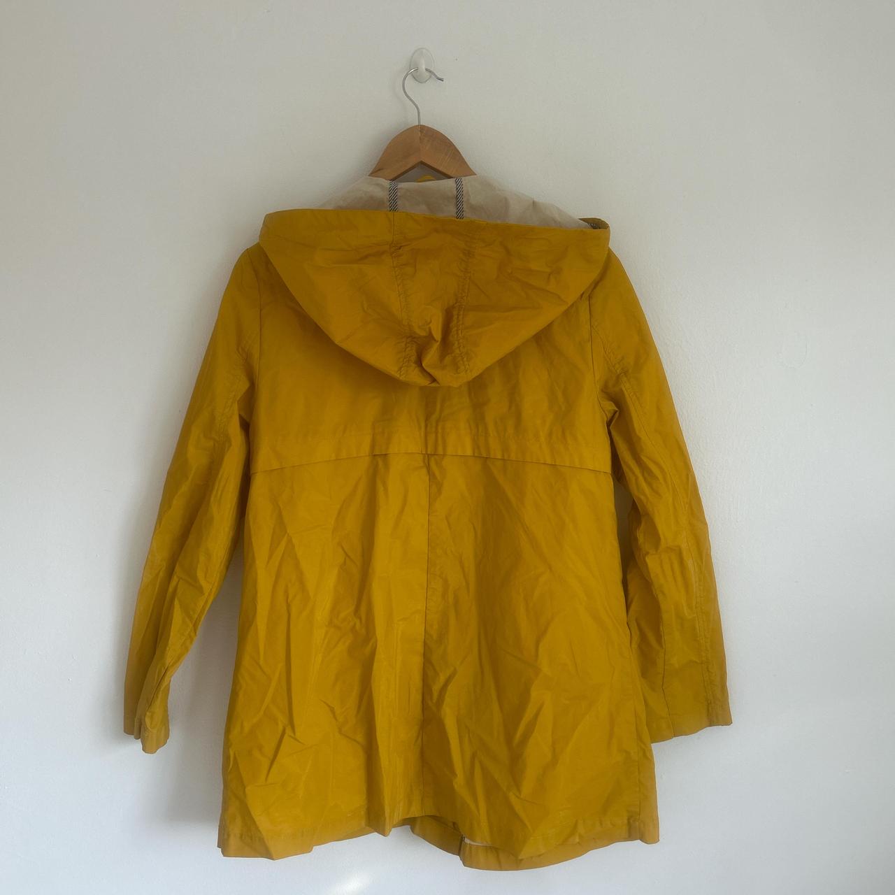 The cutest yellow/mustard rain jacket from urban... - Depop