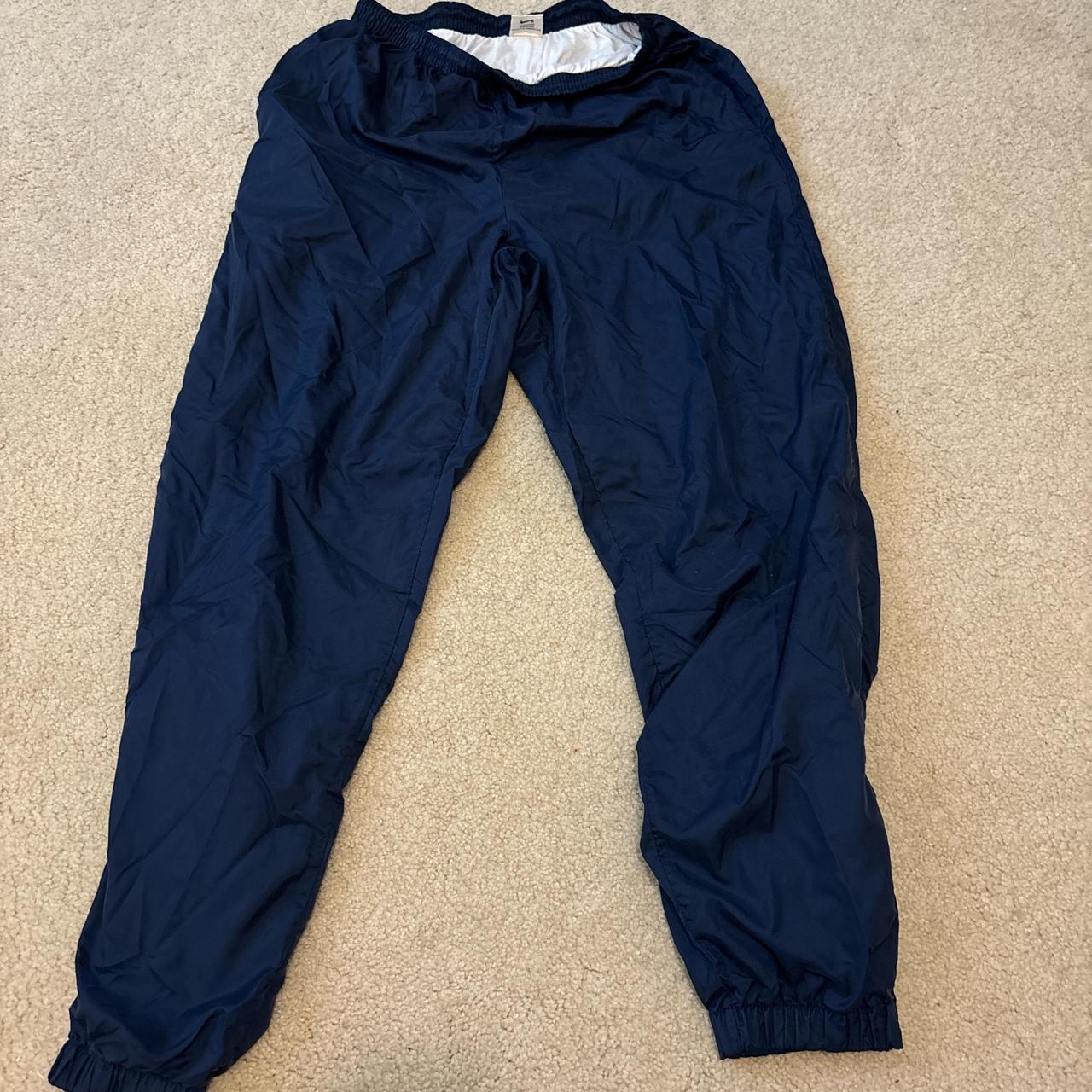 Vintage Nike Navy and white windbreaker sweatpants... - Depop