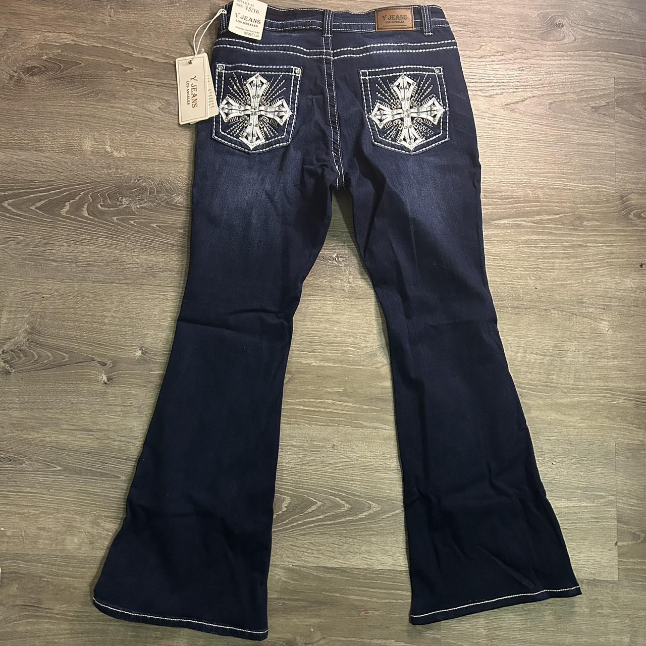 flared jeans with blinged out pockets #mcbling... - Depop