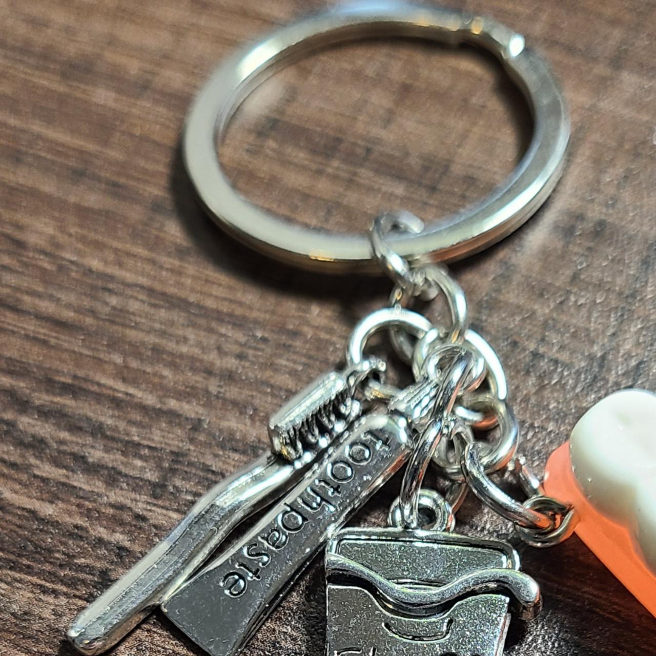 False Teeth keychain with Flosser, toothpaste and... - Depop