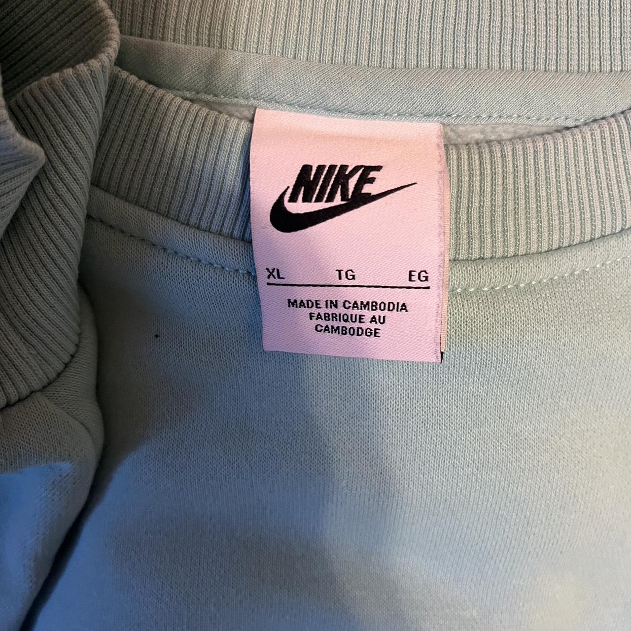 cyan colored Nike crewneck it’s a XL in kids, but... - Depop