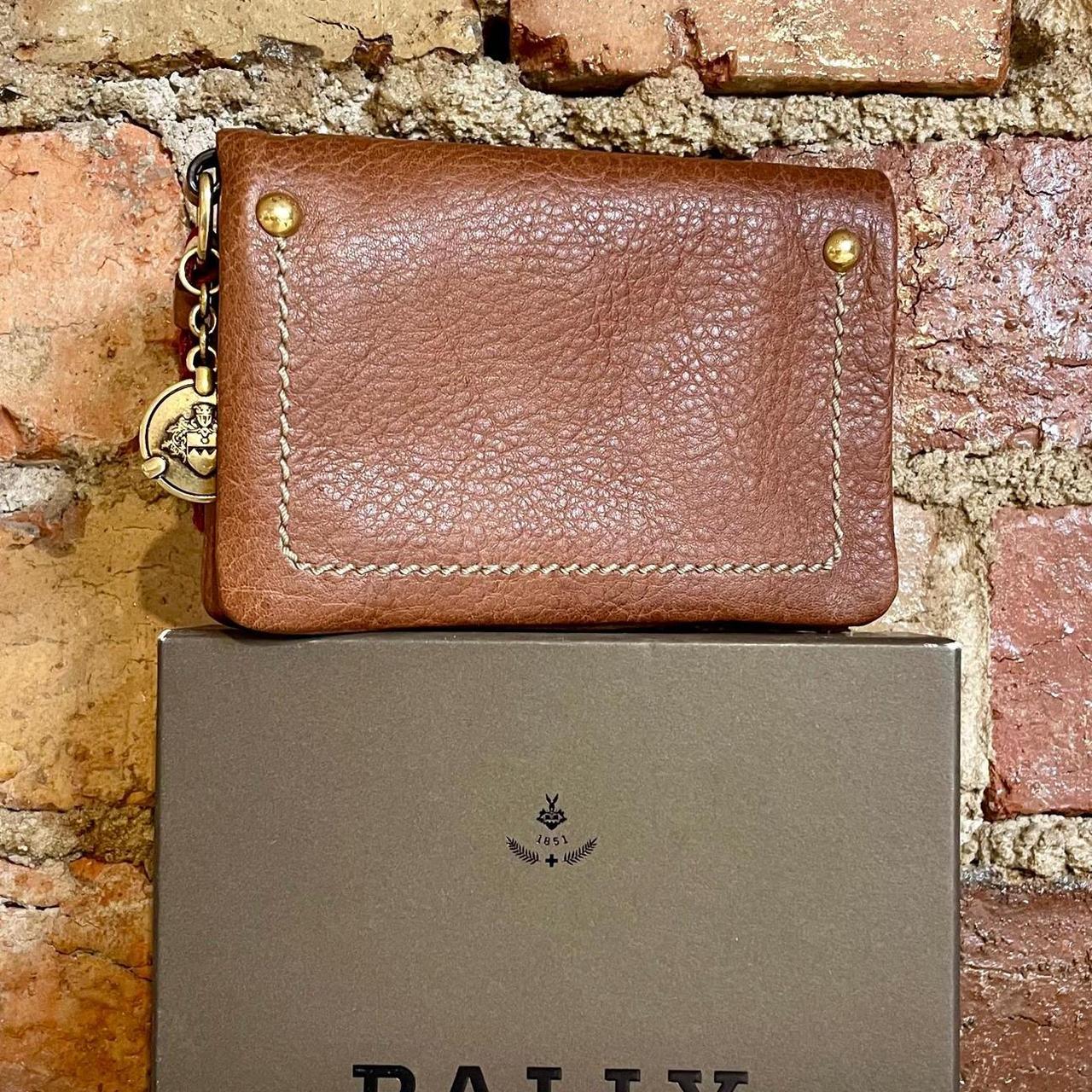 Bally brown leather wallet with gold hardware with... - Depop