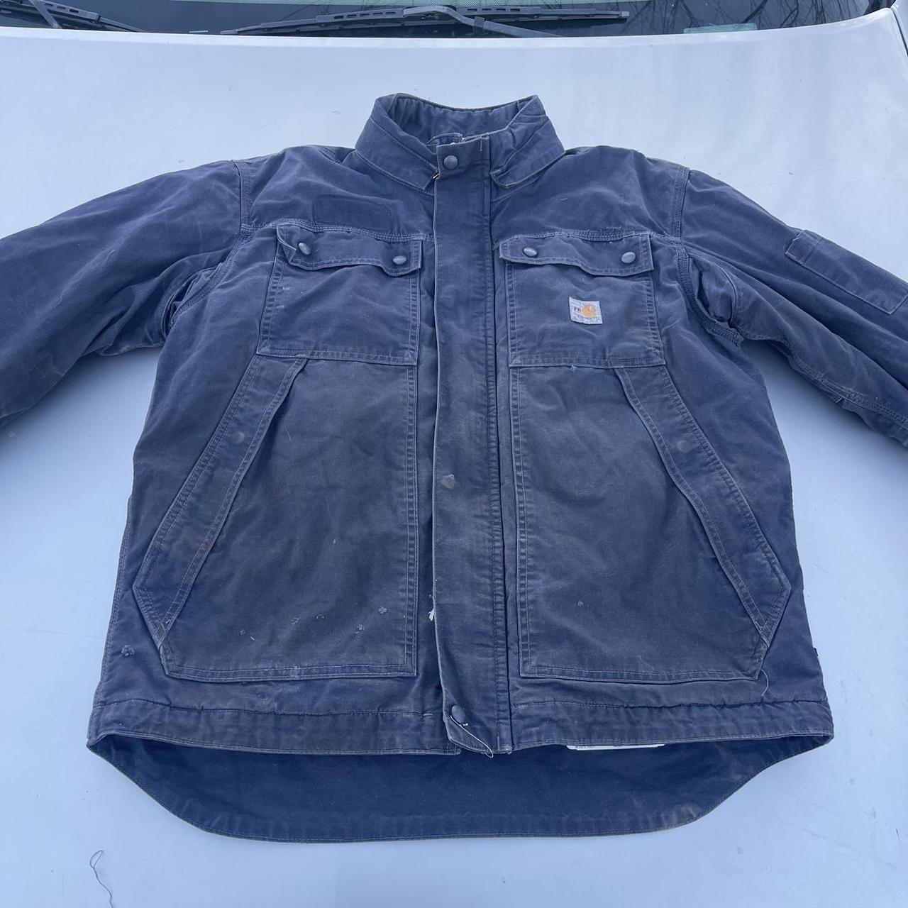 Navy Carhartt jacket with a relaxed fit #workwear | Depop