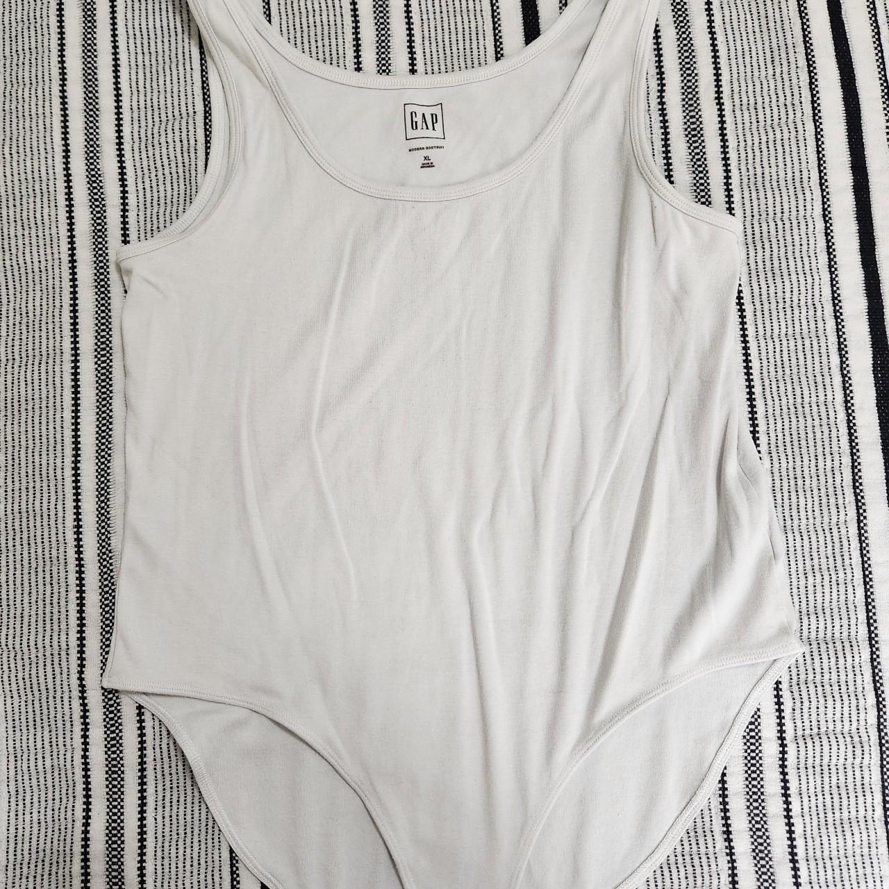 Gap white, casual bodysuit. Lots of stretch to it,... - Depop