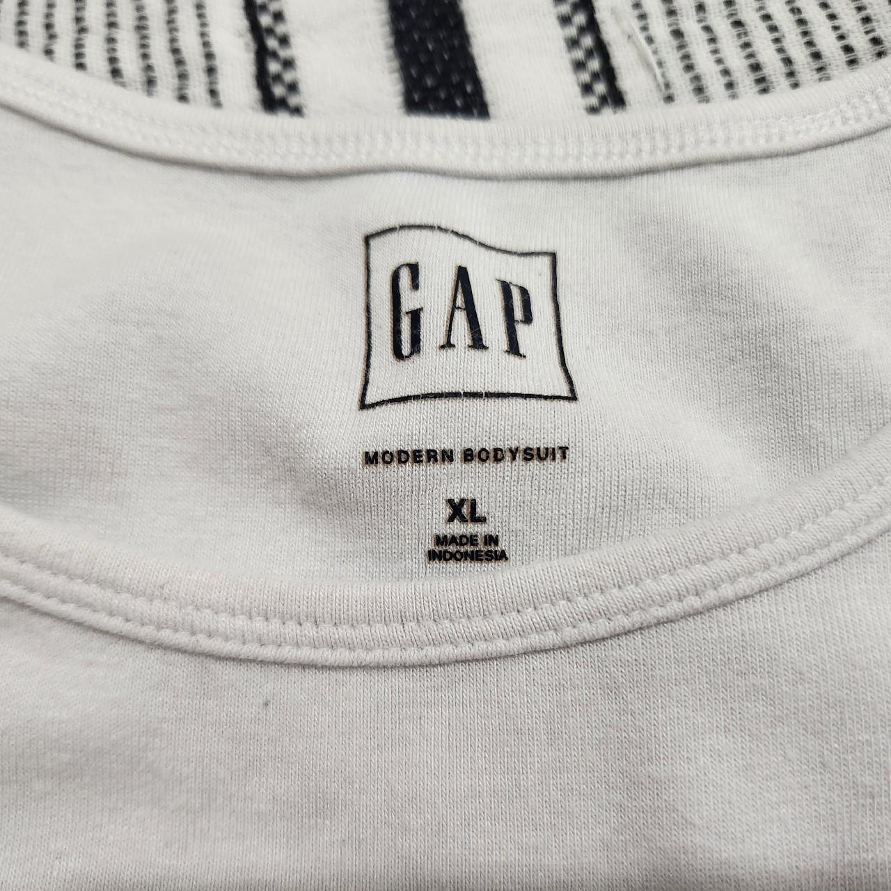 Gap white, casual bodysuit. Lots of stretch to it,... - Depop