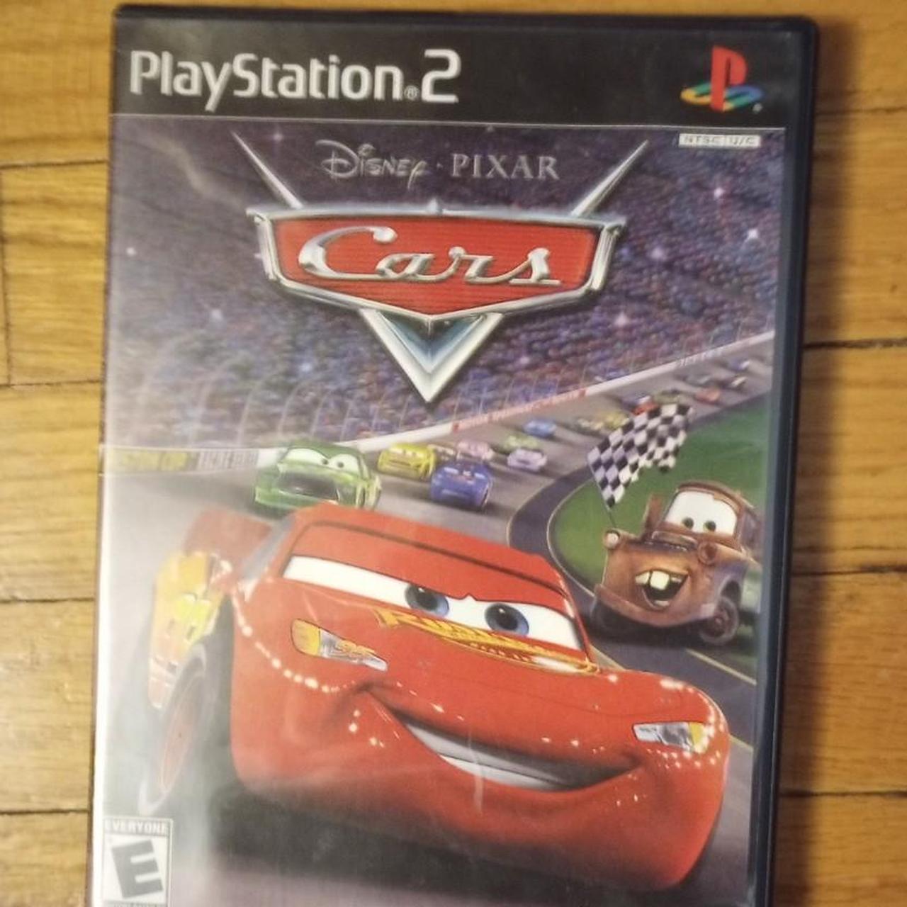 Cars PS2 game with manual disc may have scratches... - Depop