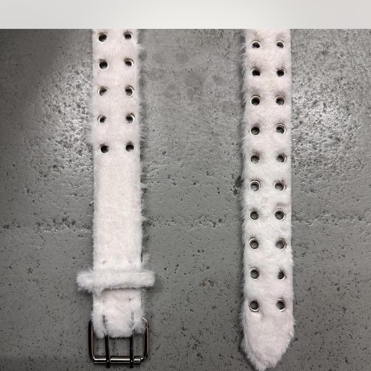 White faux fur belt with silver hardware... - Depop