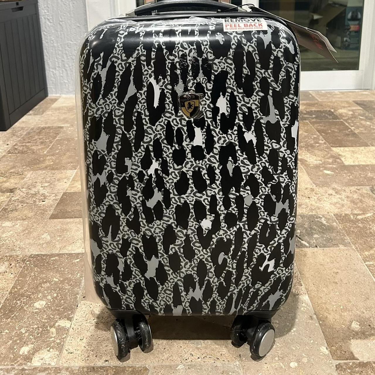 Black and white cheetah print hard shell carry on... | Depop