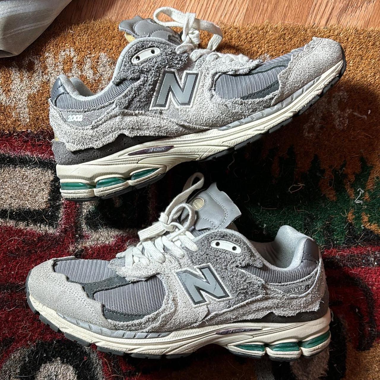 125 no box worn a little no lowball 2002r rain... - Depop