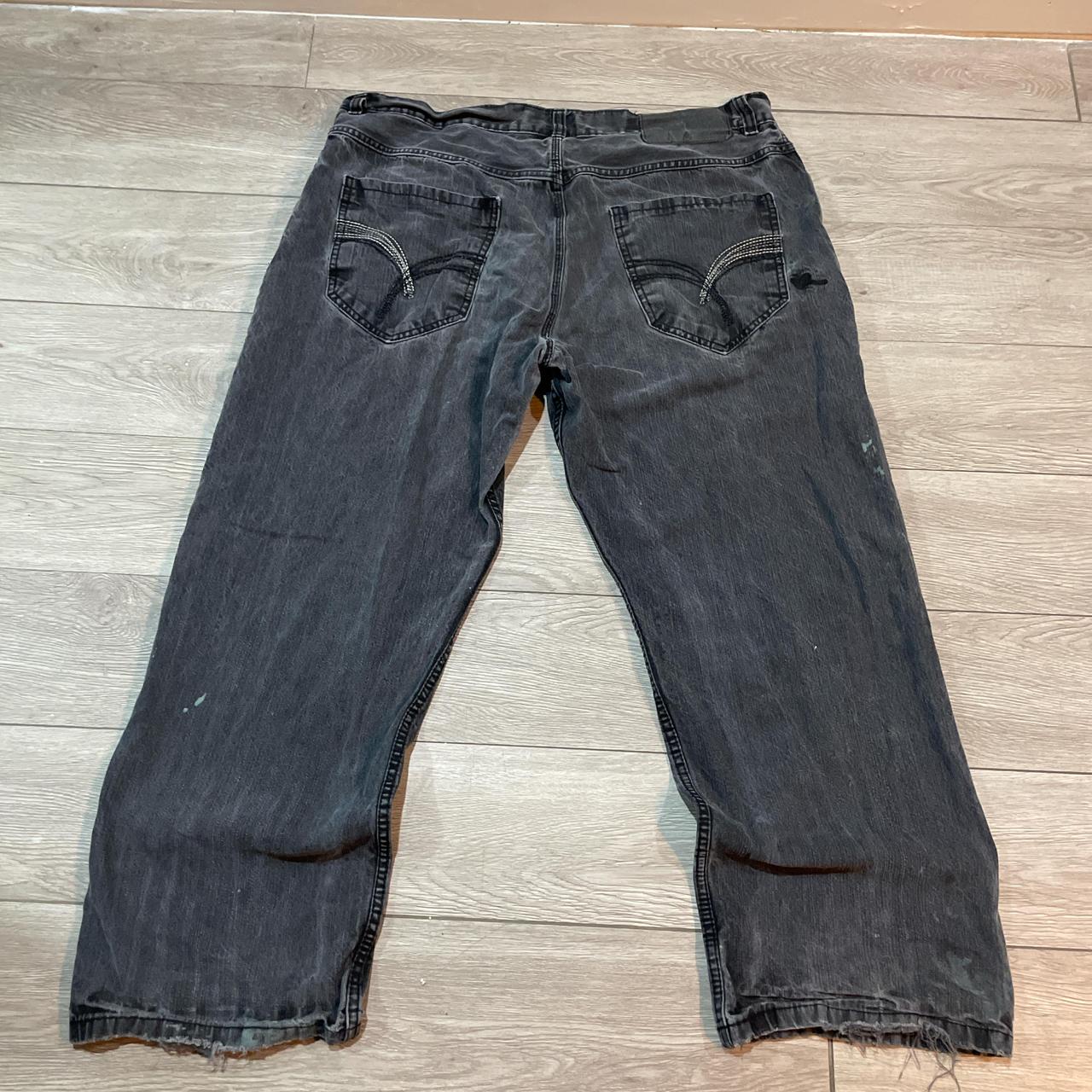 Black vintage jeans with paint stains and a small... - Depop