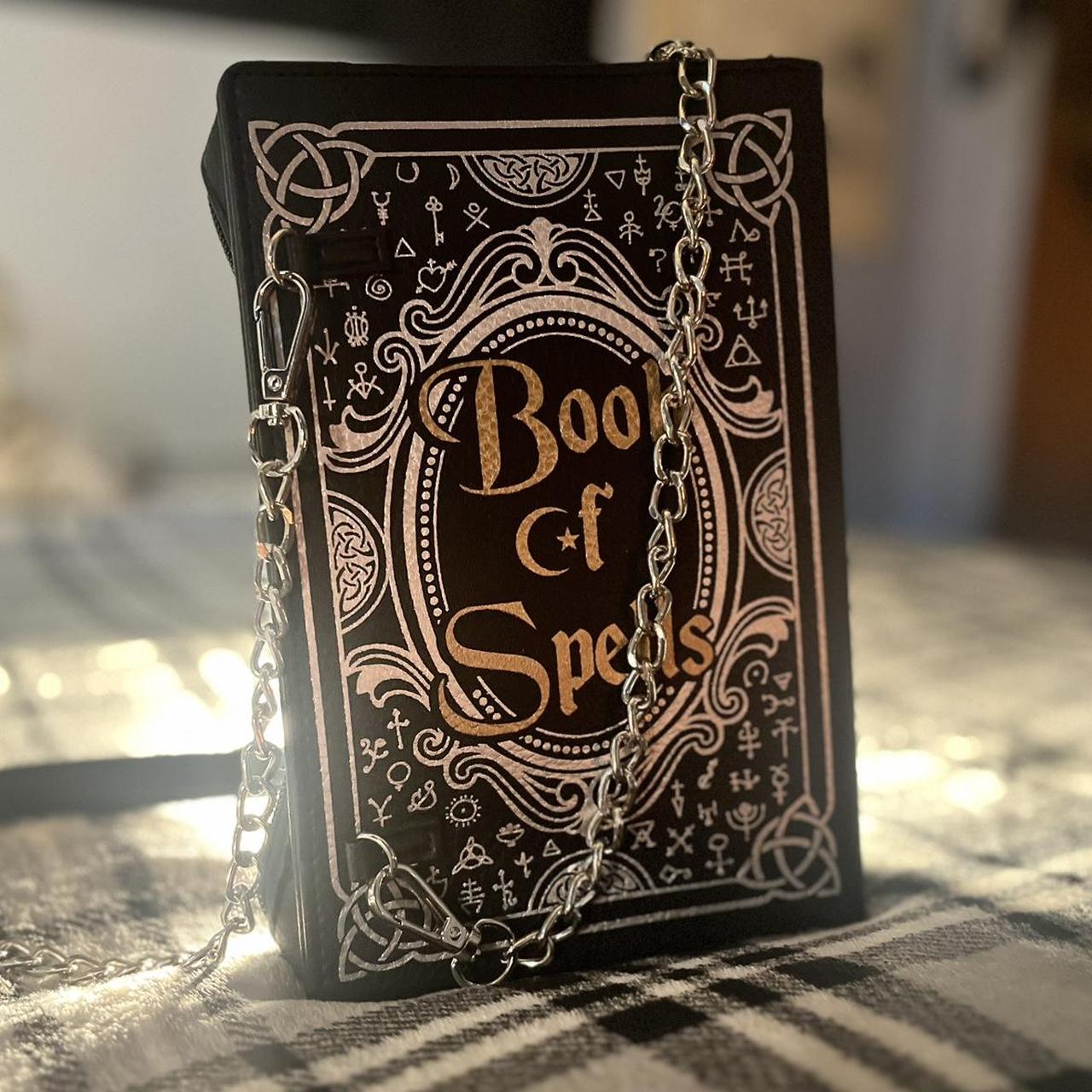 “Book of Spells” purse only used once on... - Depop
