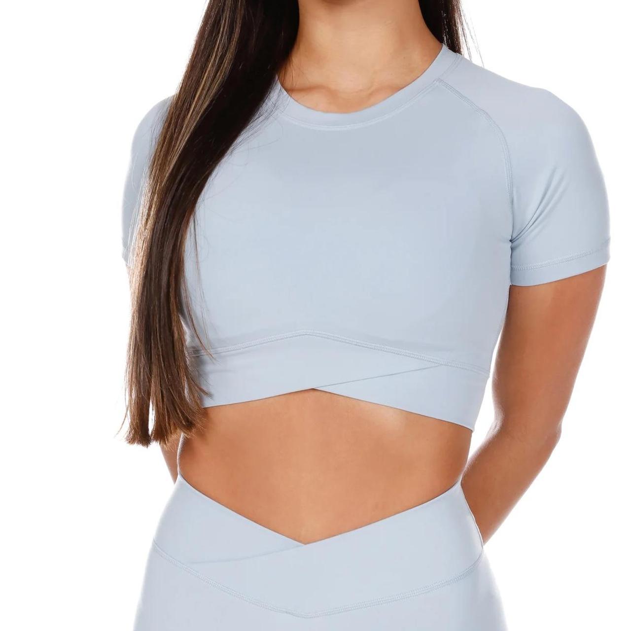 Elite eleven cross over tee in light blue size S - Depop