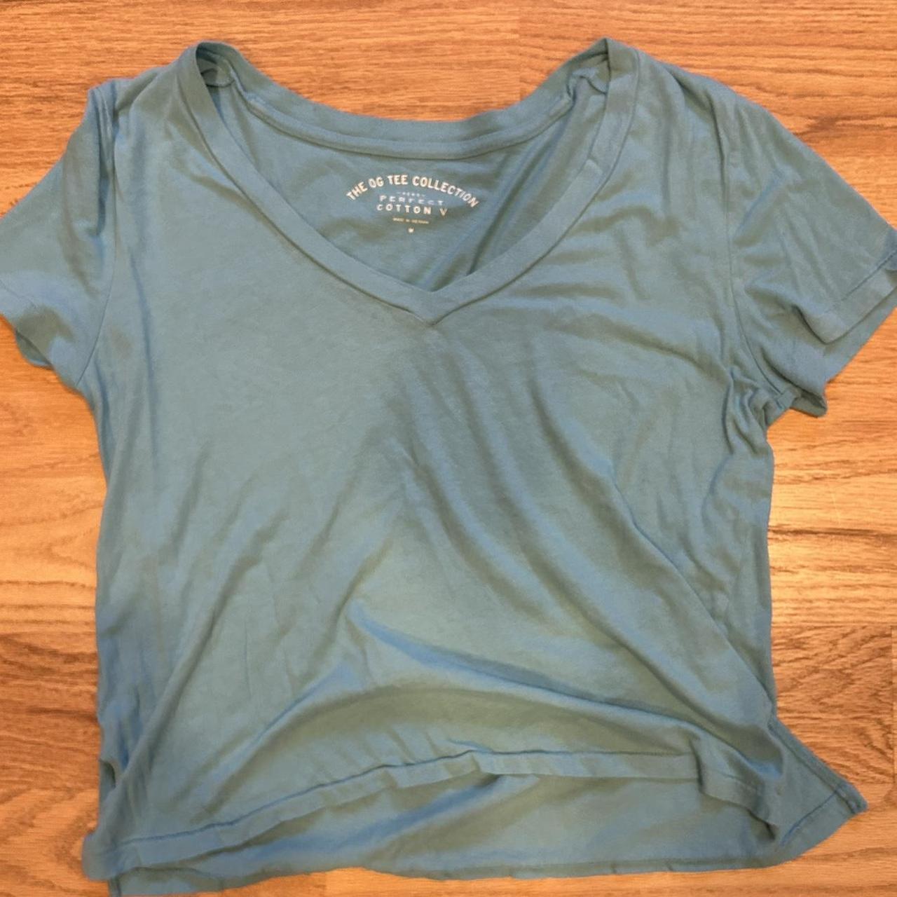 light blue v neck t shirt - Depop