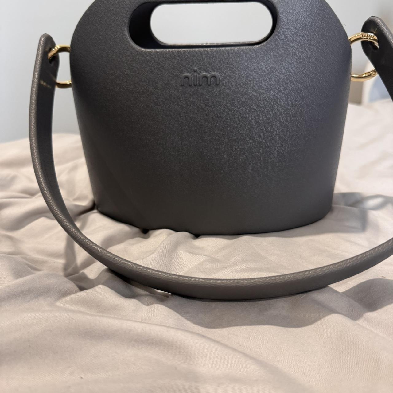 Nim the label charcoal smallest size bag. No signs... - Depop