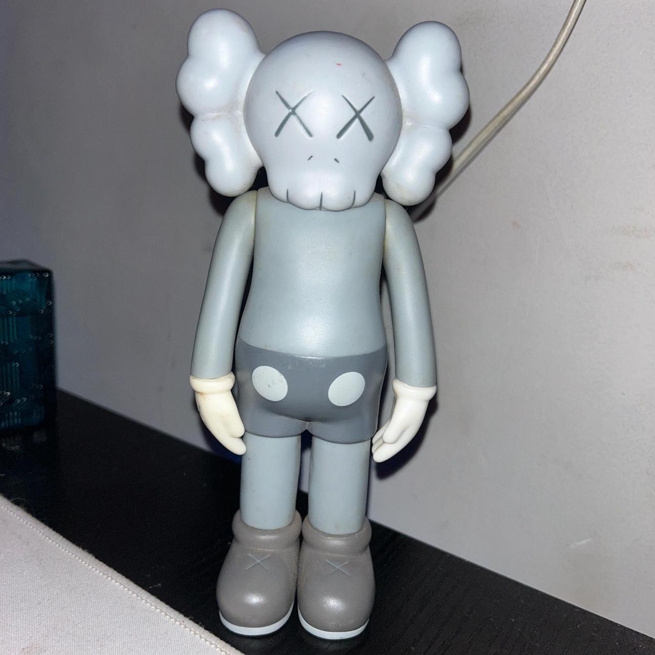 Grey kaws doll - Depop